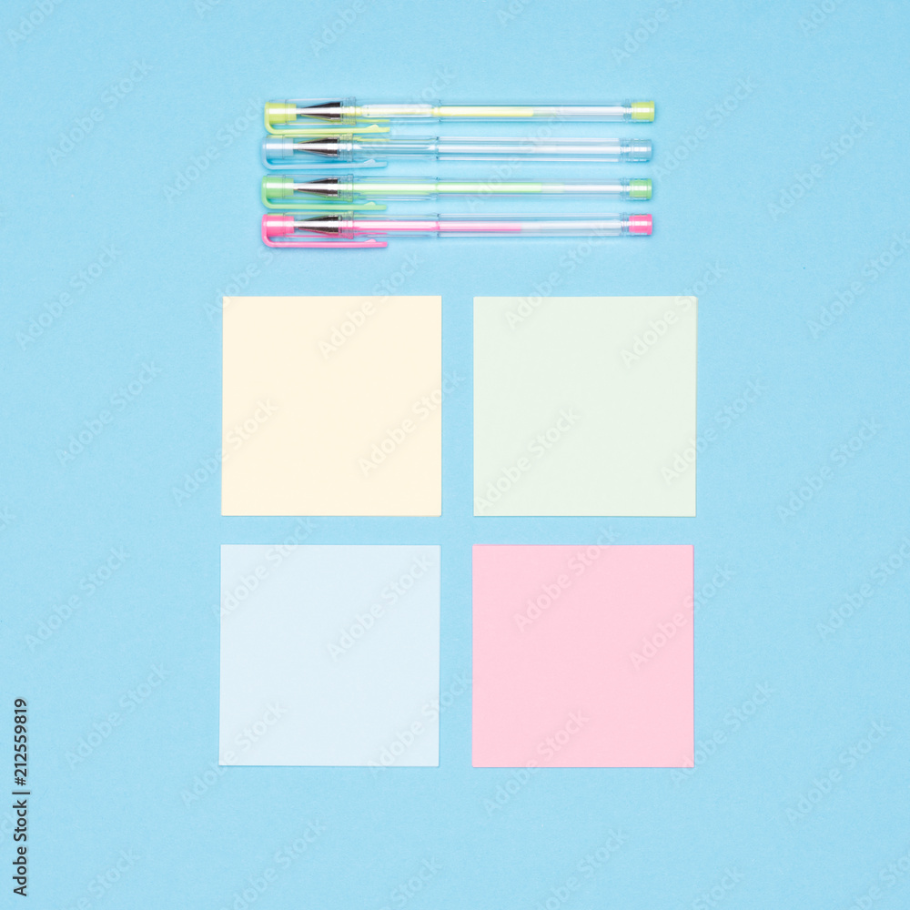 Creativity flat lay. Top view of set of sticky notes and colorful pens ...