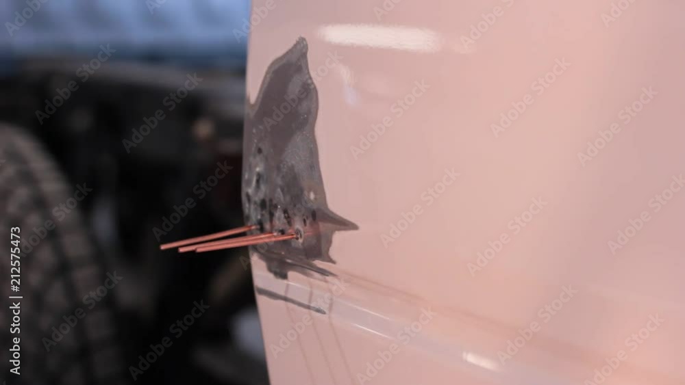 Pin Nail device Welds metal studs onto the dented area of a vehicle and ...