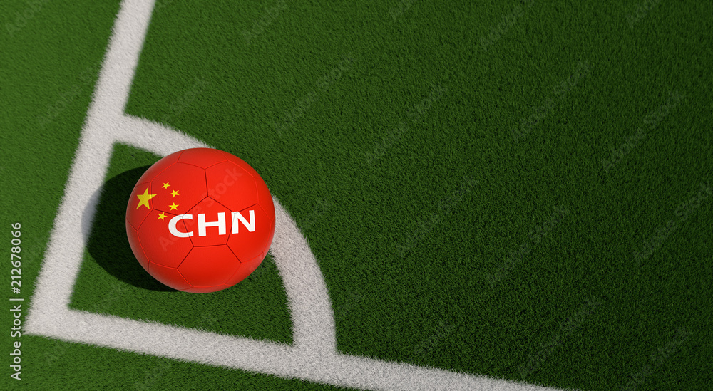 Soccer ball in China national colors on a soccer field. Copy space on ...