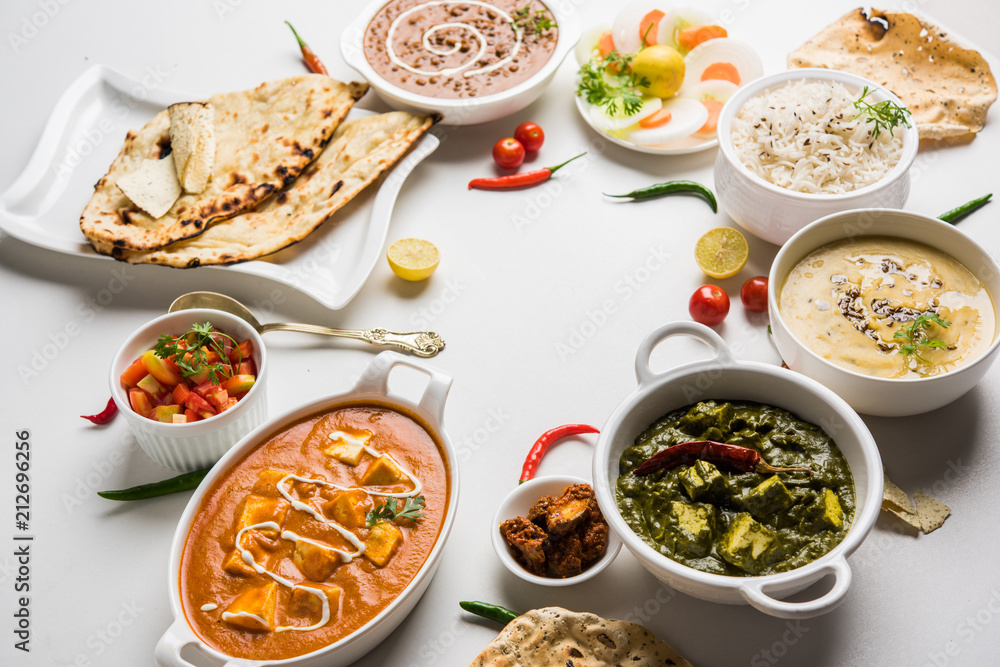 Assorted indian food for lunch or dinner, rice, lentils, paneer, dal ...