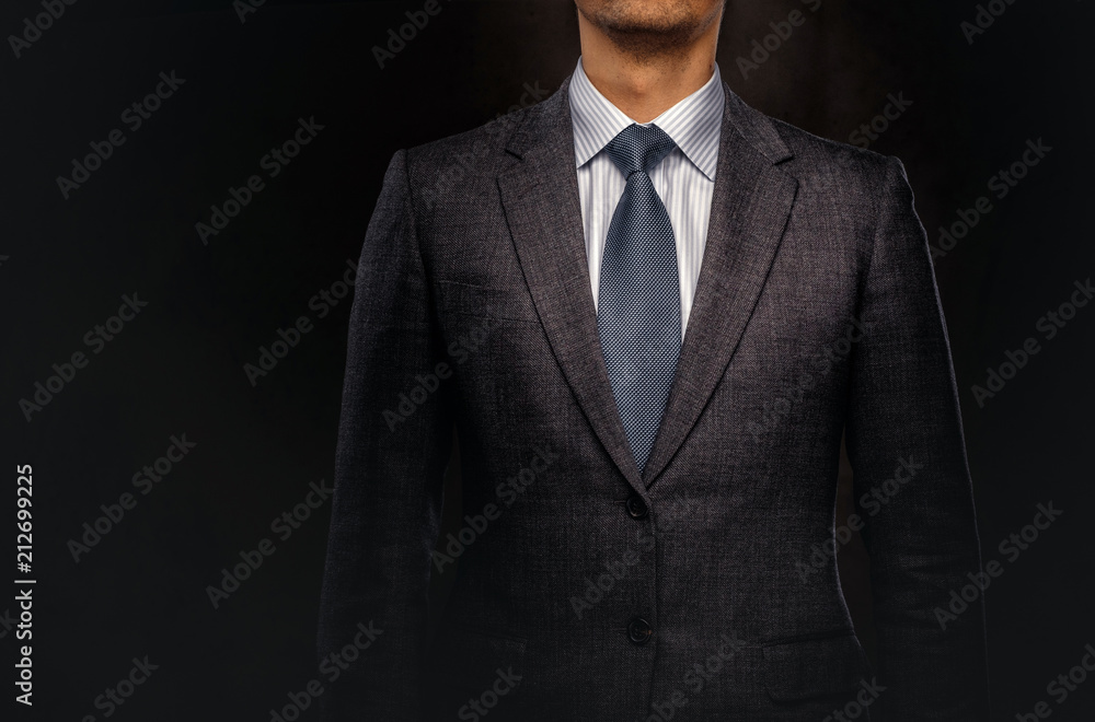 Cropped portrait of a successful businessman dressed in an elegant ...