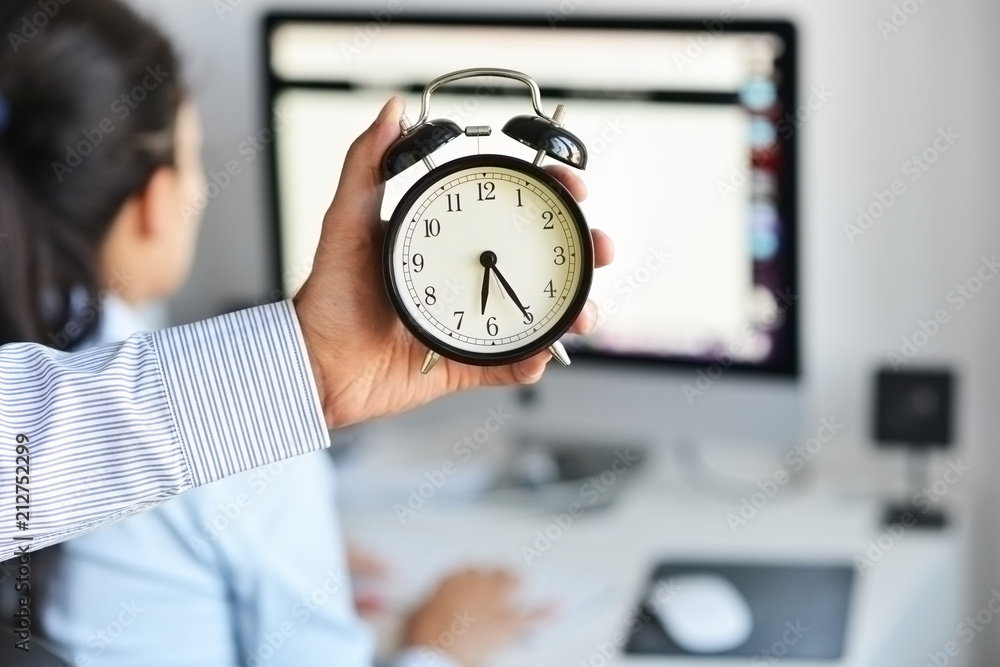 Foto de Overtime at work concept with businesswoman at the office under ...