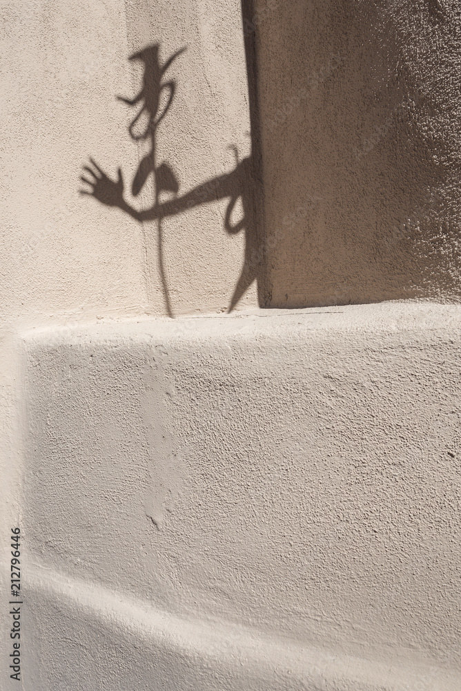 Mysterious hand shadow. Strange shadow of a man in an adobe wall Stock ...