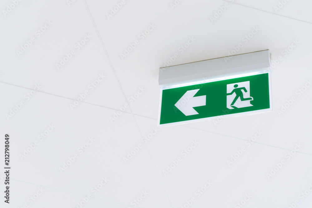 Ceiling mounted emergency exit sign or fire escape sign Stock Photo ...