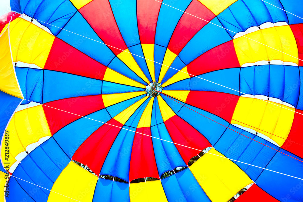 Falling open color parachute Bright background Stock Photo | Adobe Stock