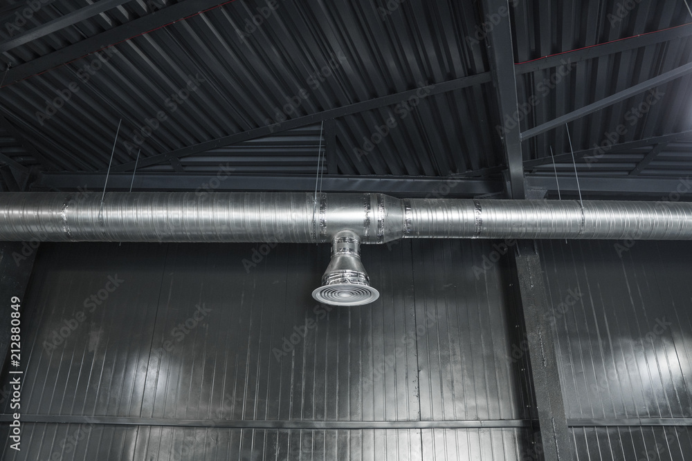 Ventilation system on the ceiling of large buildings. Ventilation pipes ...