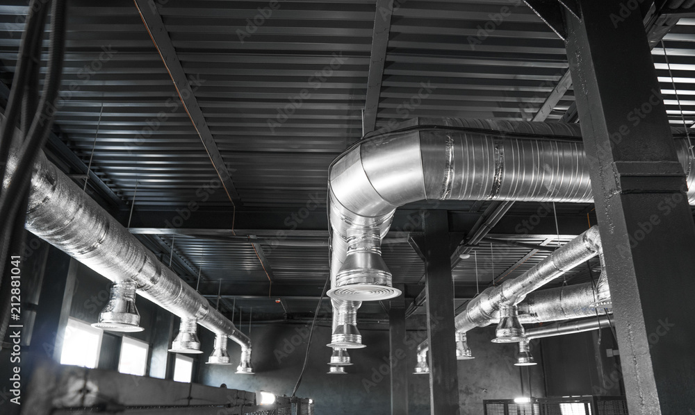 Ventilation system on the ceiling of large buildings. Ventilation pipes ...