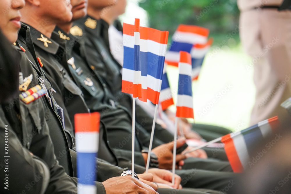 thai soldiers army in green uniform sit and hold thailand flag Stock ...