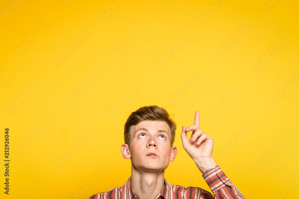 look up. funny comic man pointing upward with a hand. portrait of a ...