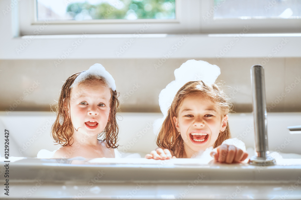 children are bathing in a bath Stock Photo | Adobe Stock