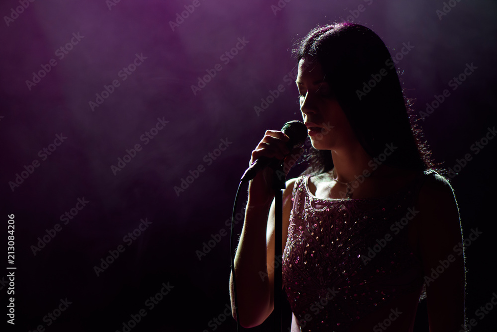 close up image of live singer on stage Stock Photo | Adobe Stock