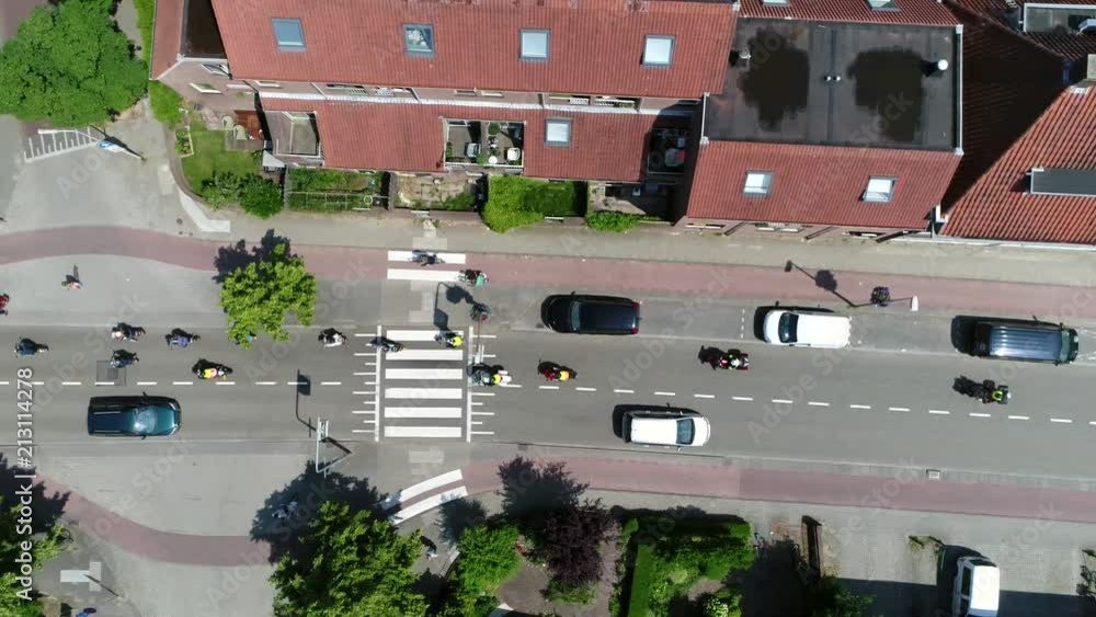 Aerial view of busy streets filled with small motorcycles and mopeds in ...