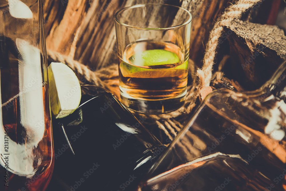 Alcohol in an old bar on a pirate ship with vintage rum and whiskey ...