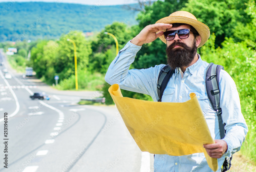 Old school navigation. Backpacker use paper map for navigation ...