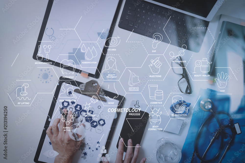 top view of smart medical doctor working with mobile phone and laptop ...