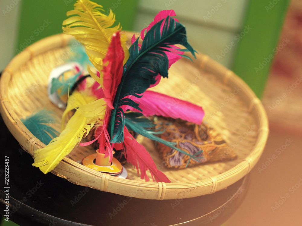 capteh, a kind of traditional game with a rubbery head and feathers ...