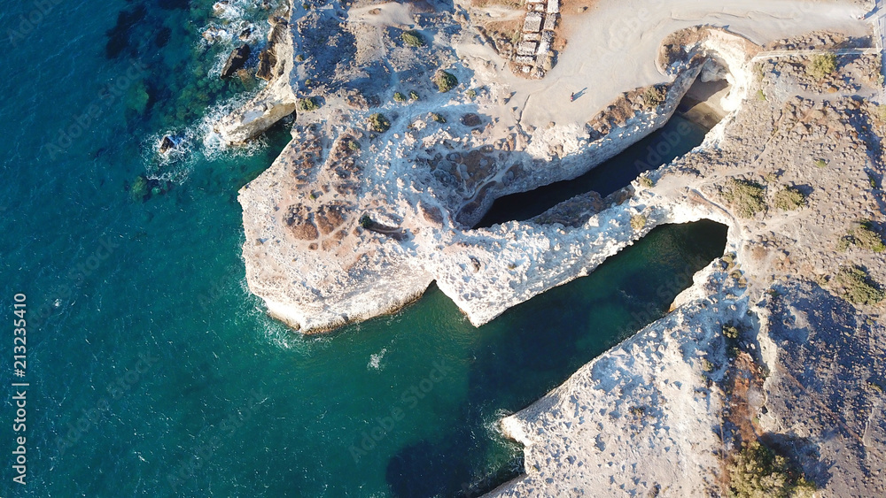 Aerial drone bird's eye view of iconic lunar volcanic white chalk caves ...