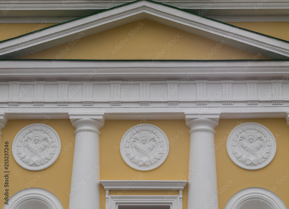 Plaster and decor in classical architecture. The facade of the historic ...