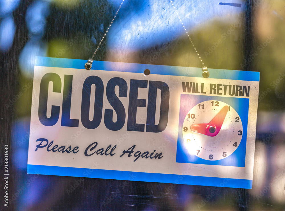 Closed sign with clock display Stock Photo | Adobe Stock
