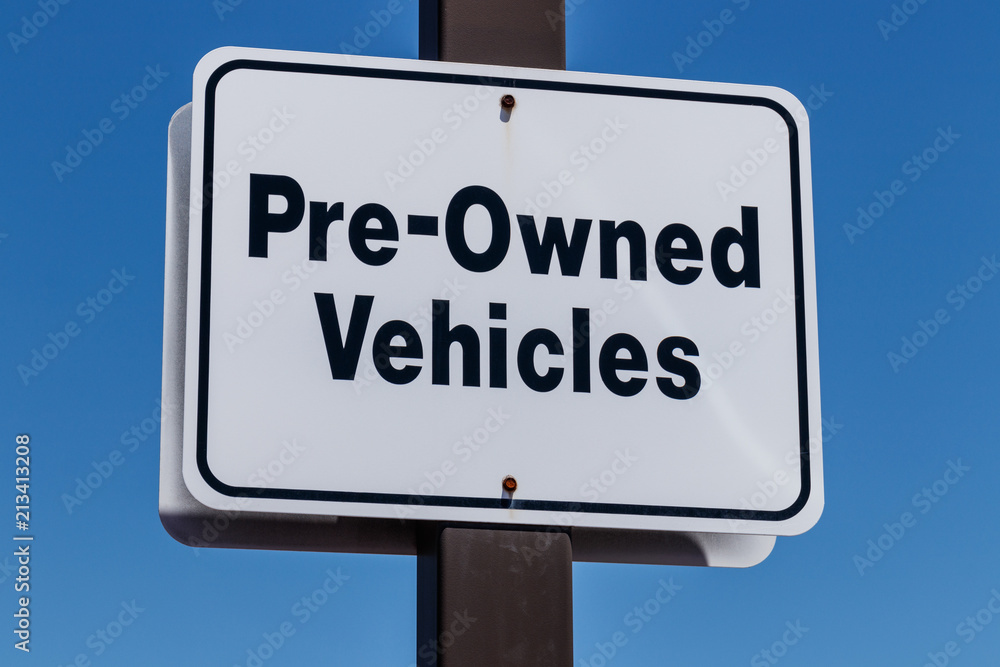 Pre Owned Vehicles sign at a Used Car Dealership I Stock Photo | Adobe ...