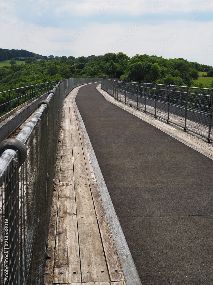 Looking across the top of the Victorian wrought iron Meldon Viaduct ...
