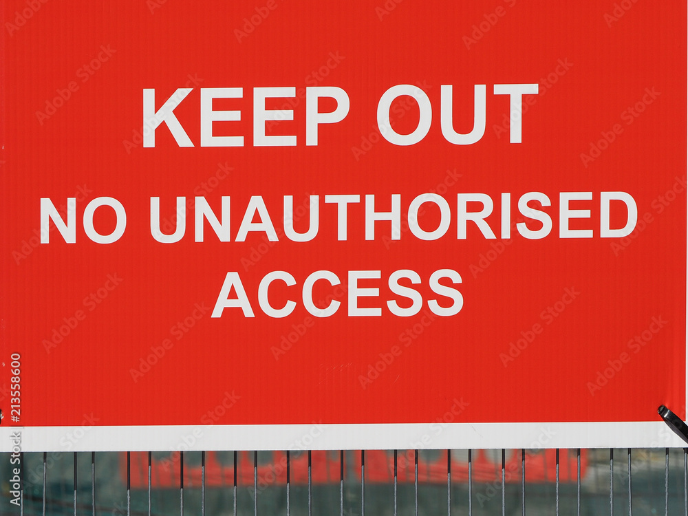 Keep Out No Unauthorised Access warning sign in a construction site ...