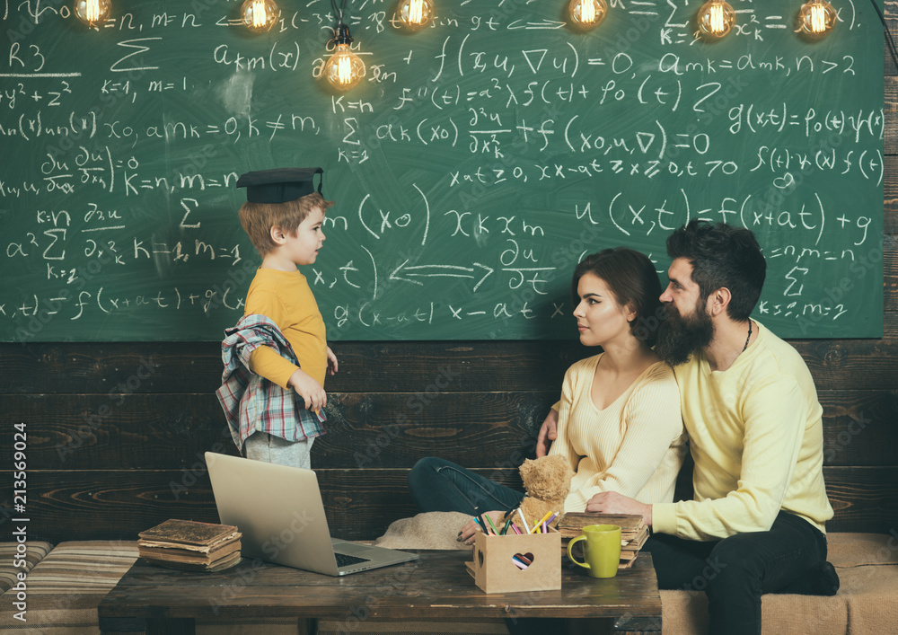 Lesson concept. Little boy answer lesson in classroom. First lesson at ...