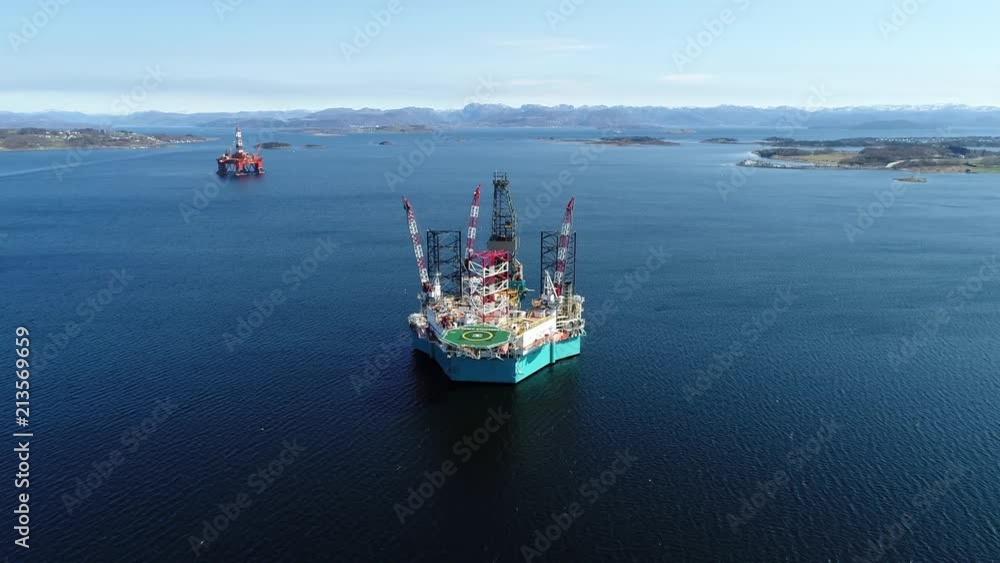Vidéo Stock Aerial footage of Oil and Gas Drilling rigs jackup and a ...