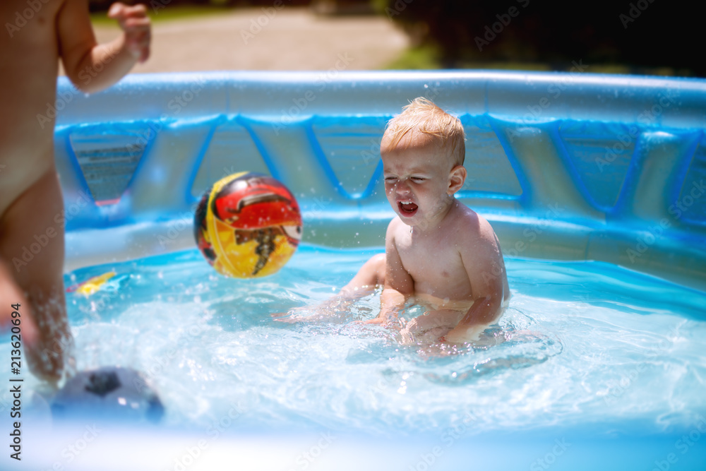 Kids Playing At The Pool