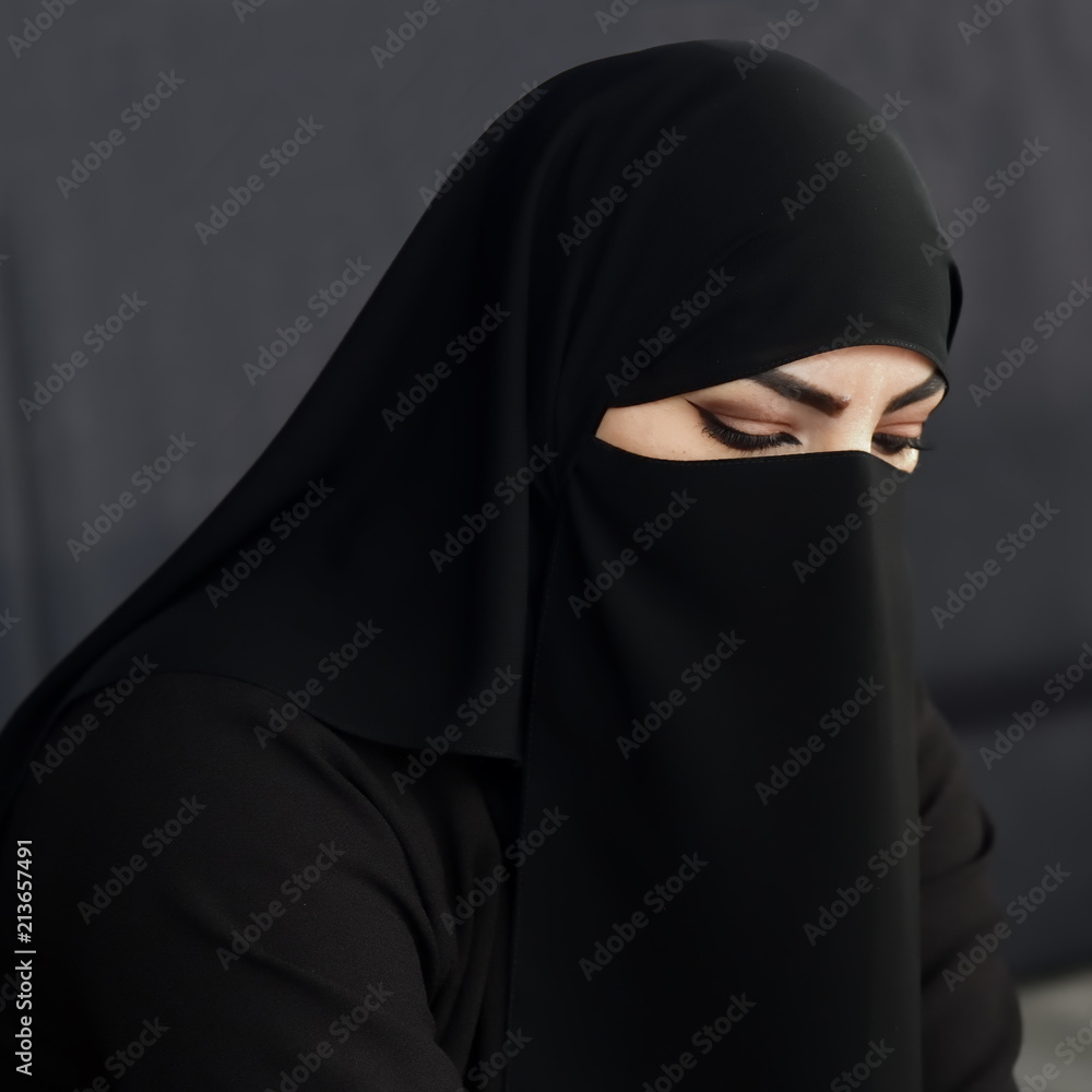 Muslim woman in niqab. Qatar Stock Photo | Adobe Stock