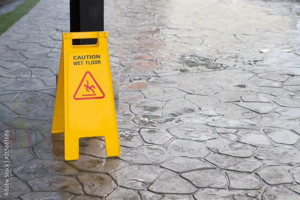 wet floor warning sign on floor Stock Photo | Adobe Stock