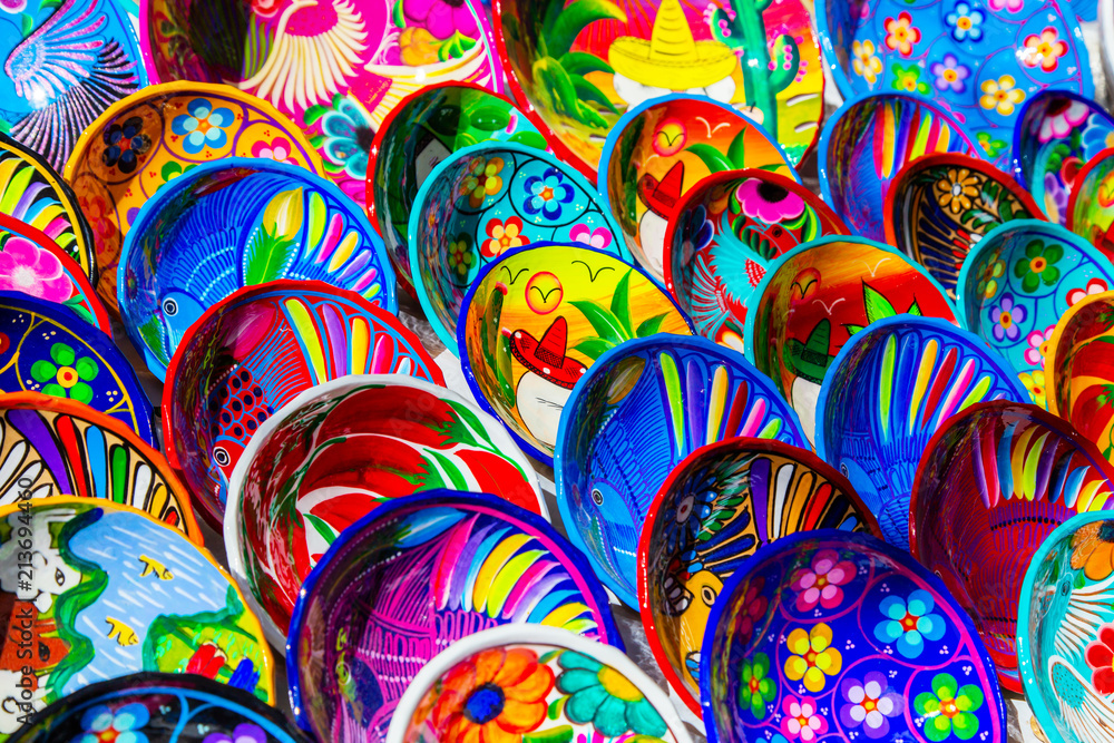 Plates in the traditional Mexican style. Souvenirs from Chichen Itza ...