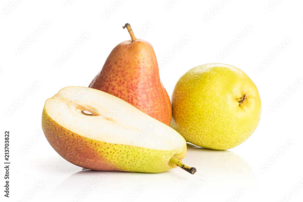 Group of two whole one half of fresh red pear forelle variety isolated ...