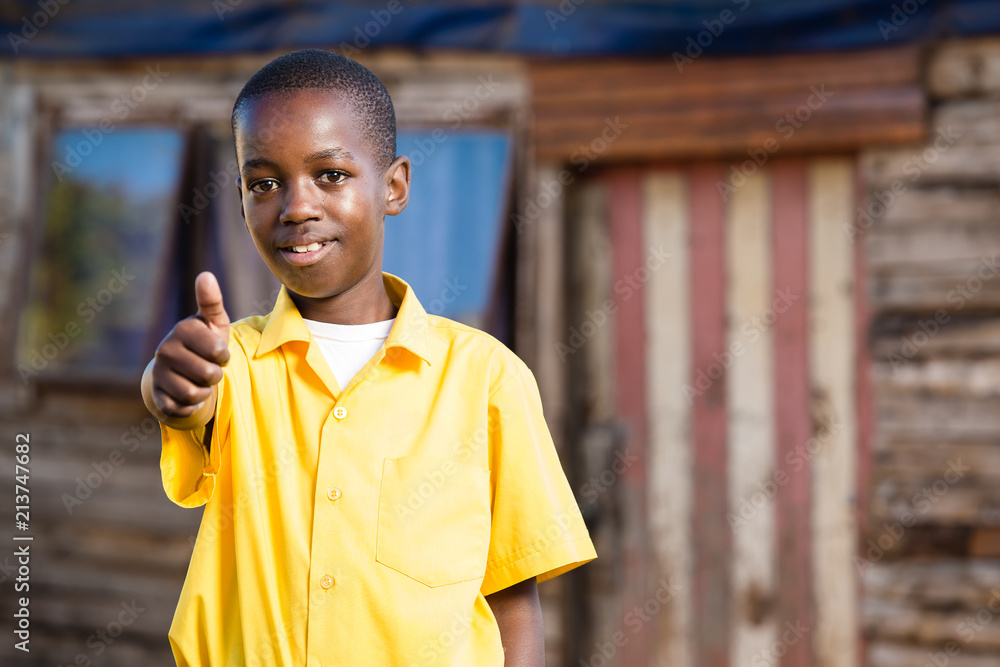 Black boy showing a thumbs up Stock Photo | Adobe Stock
