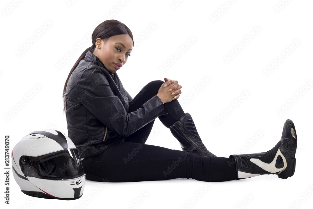 Black female racer or biker or stuntwoman sitting with a racing helmet ...