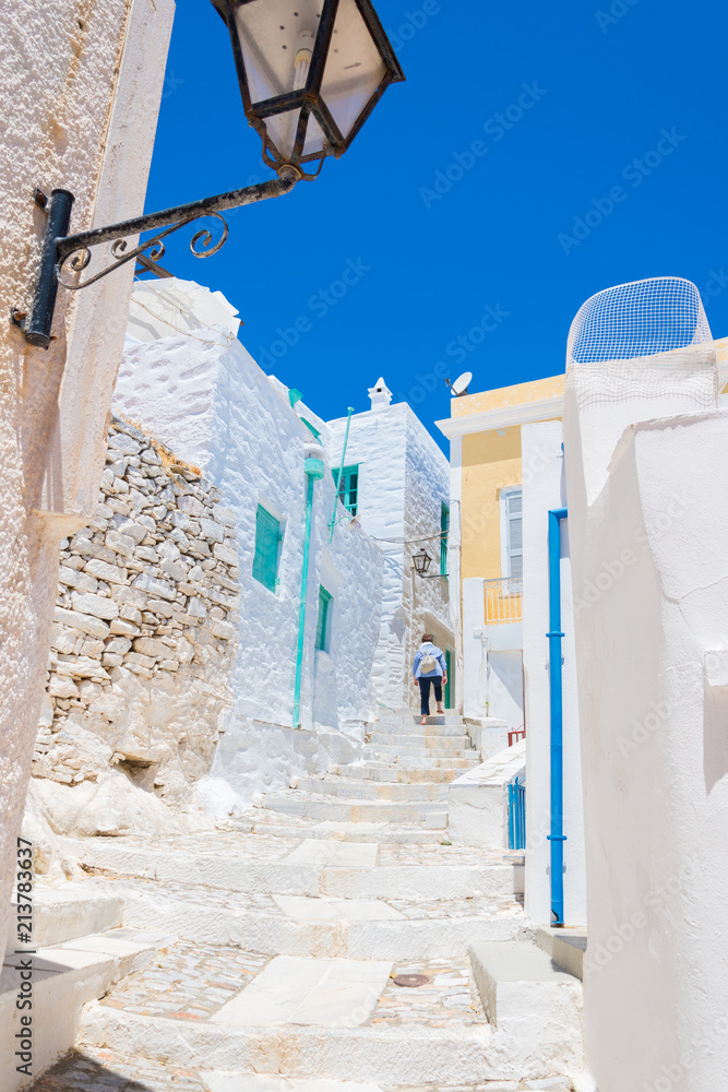 Paved narrow alley of Ano Syros in Syros island, Cyclades, Greece ...