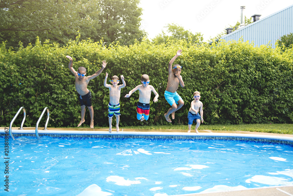 Children in outside swimming pool Stock Photo | Adobe Stock