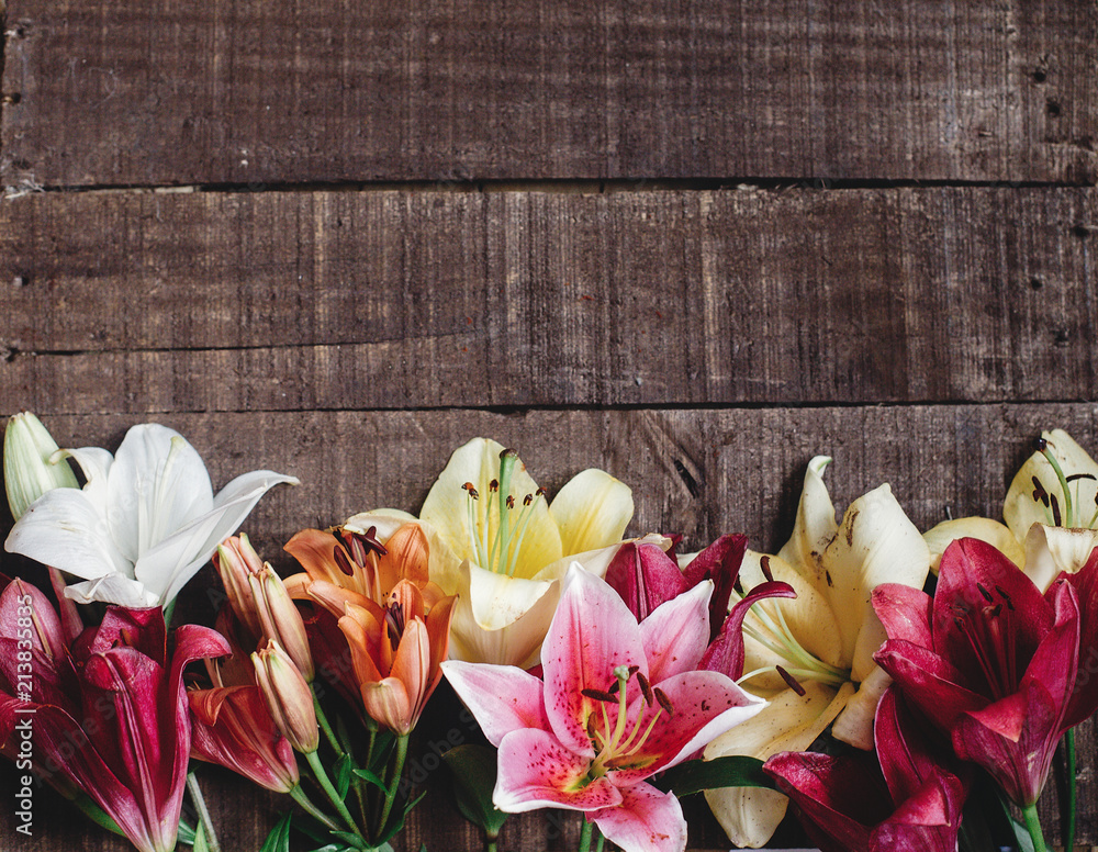 bright spring flowers on rustic background. hello spring. women or ...