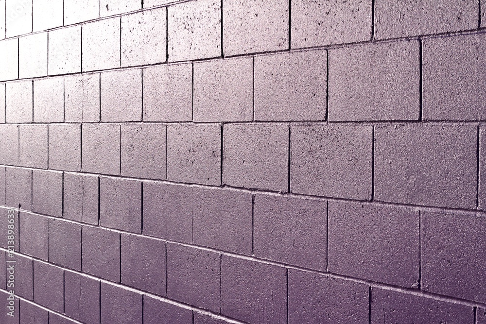 Purple painted concrete block wall - angle view Stock Photo | Adobe Stock