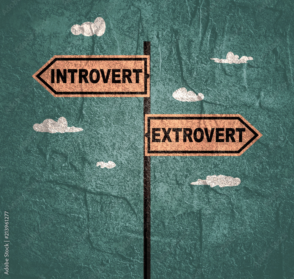 Road signs with Introvert and Extrovert text pointing in opposite ...