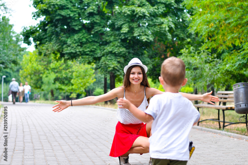Happy 2 Year Old Boy Running Into The Arms Of His Loving Mother For A happy-2-year-old-boy-running-into-the-arms-of-his-loving-mother-for-a