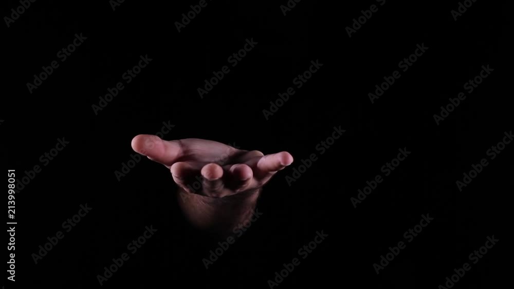 Hand Gestures coming out of the dark into the light. Holding GFX object ...