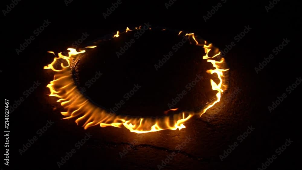 Stockvideon A circle of fire igniting in slow motion for use with ...