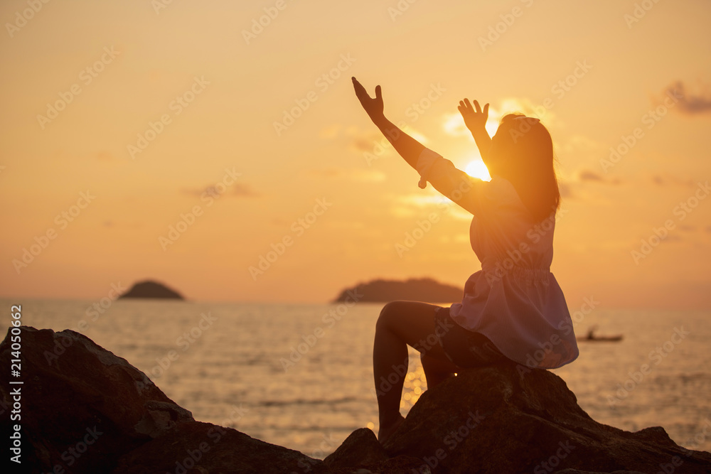 Women raised both hands up pray for blessings to God hands lift worship Stock Photo | Adobe Stock
