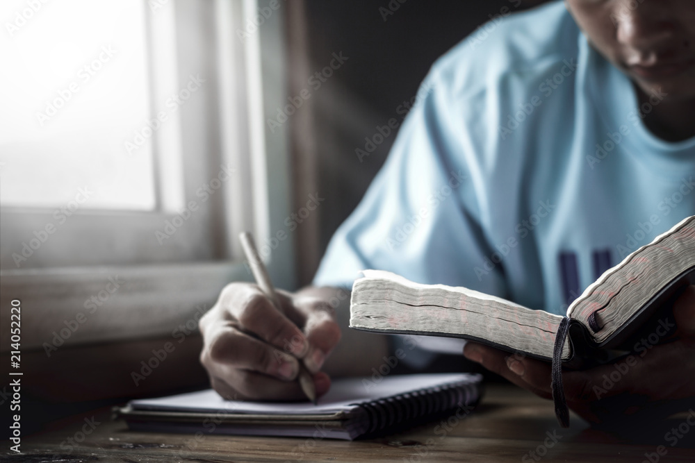 Man Writing A Book