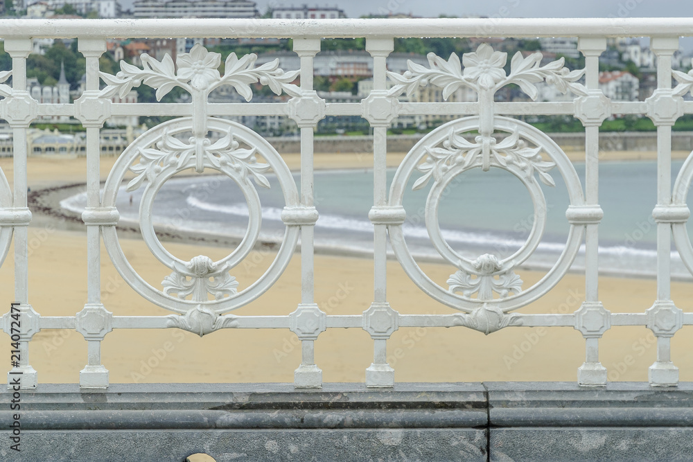 detail of the famous railing of the beach promenade of La Concha in the ...