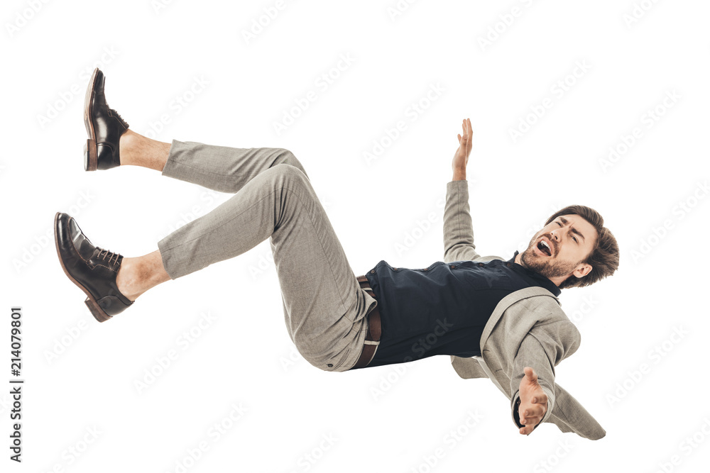 shouting young businessman in suit falling isolated on white Stock ...