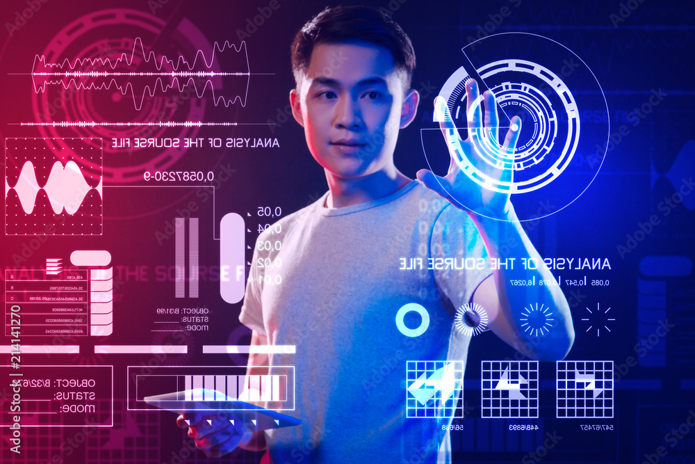 Productive day. Smart experienced computer system analyst standing with ...