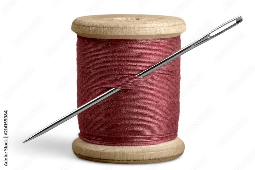 Spool of Thread and Needle Stock Photo | Adobe Stock