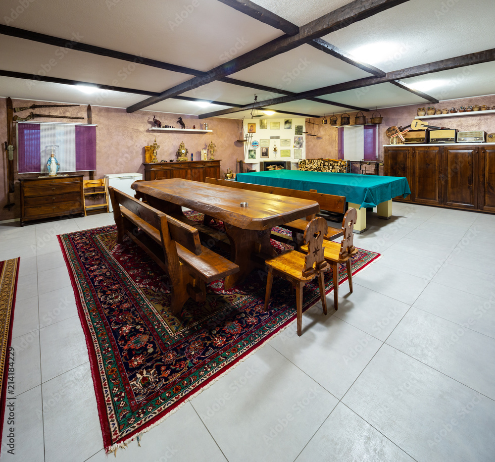 Tavern in a private house with a large wooden table Stock Photo | Adobe ...